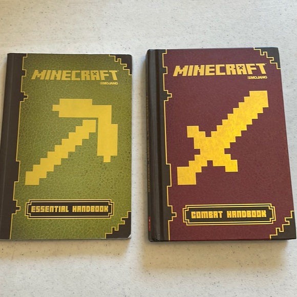Scholastic | Other | 2 Minecraft Mojang Handbooks Essential Combat ...